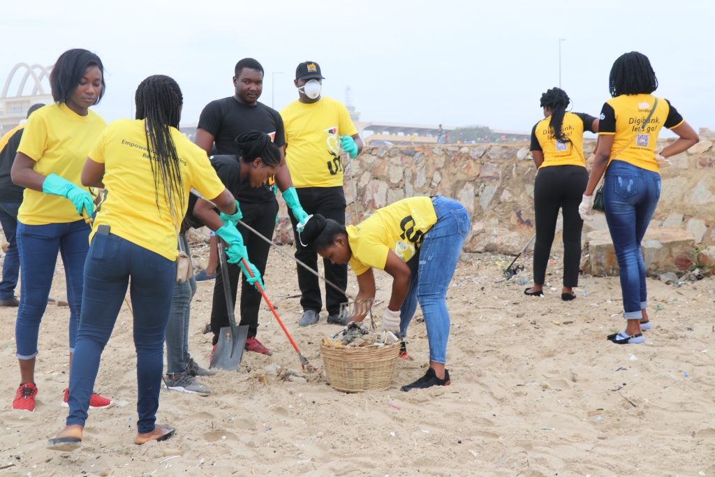 A group of UMB staff gathering litter for disposal - Universal Merchant ...